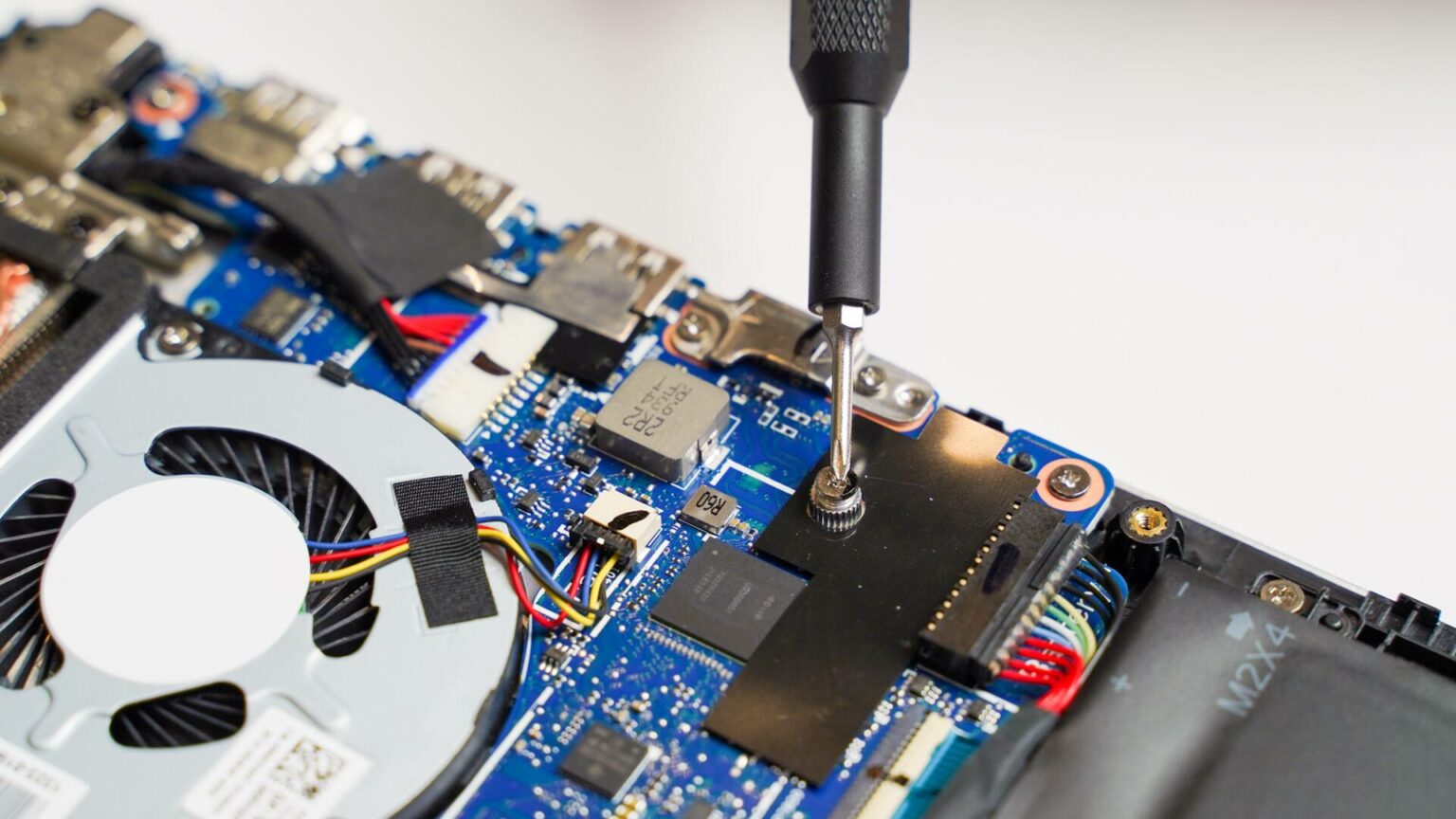 Step-by-Step Guide for Installing an M.2 SSD and RAM into a Dell Laptop